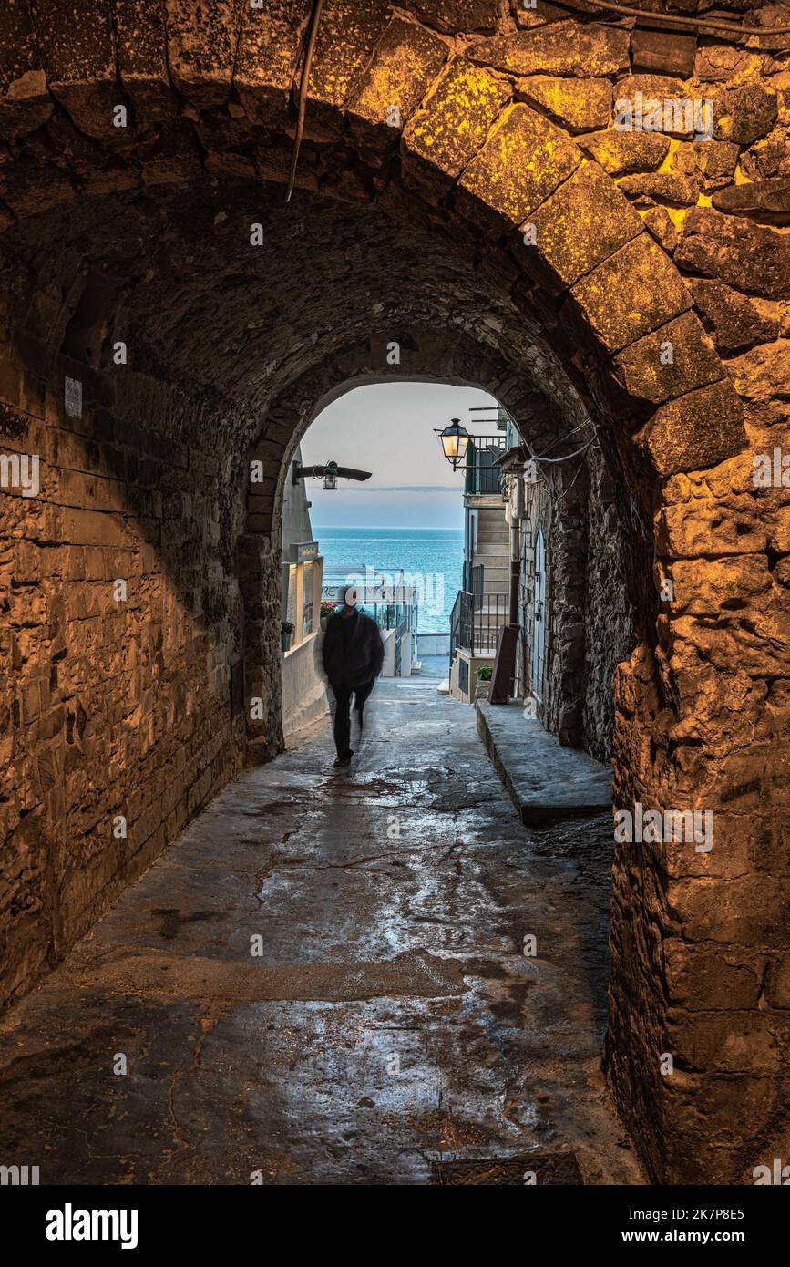 Characteristic alley with the classic staircase of the city of Vieste ...