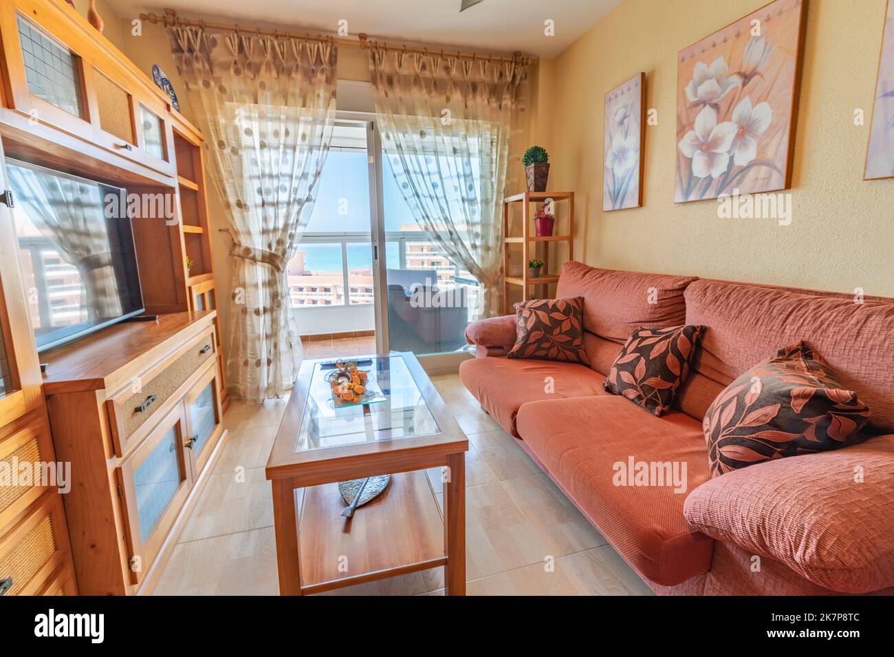 a view from inside a living room with views overlooking the coast of ...