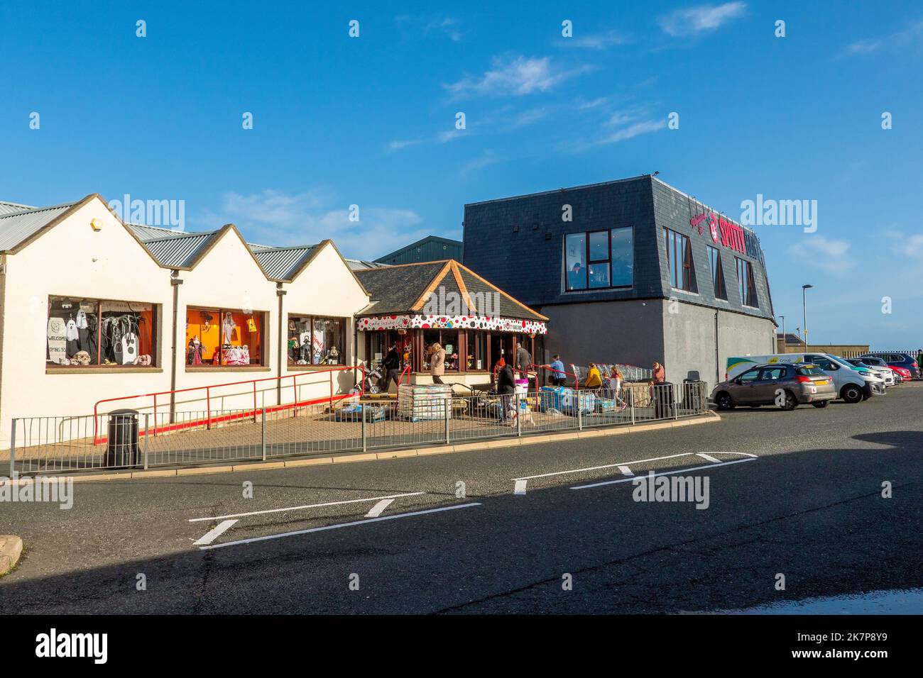 Customers coming and going from the Spotty Bag Shop in Banff ...