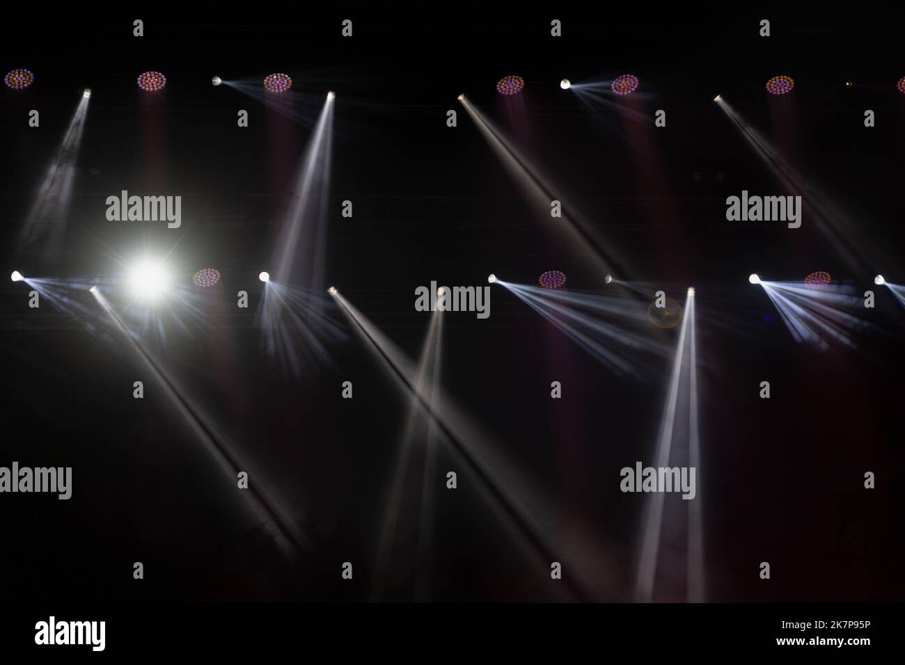 Stage lighting. Spotlights with colored lights on a stage. Artificial ...