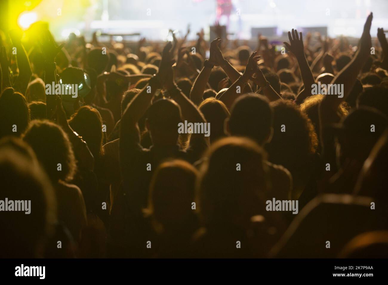 People with mobile phones at a concert. Hands with mobile phone. public ...