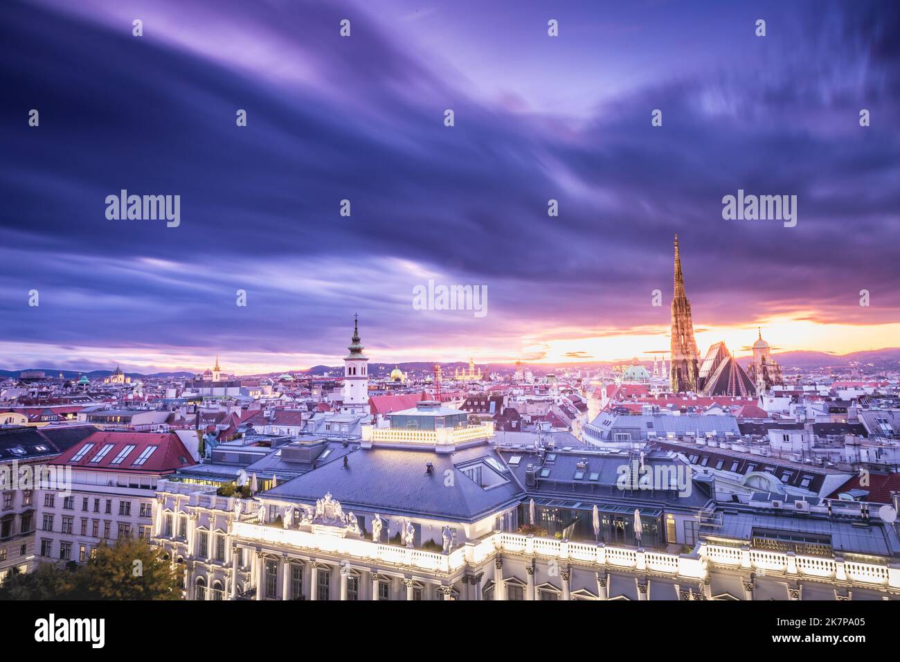 St. Stephen's Cathedral and Vienna old town cityscape at dramatic sky ...