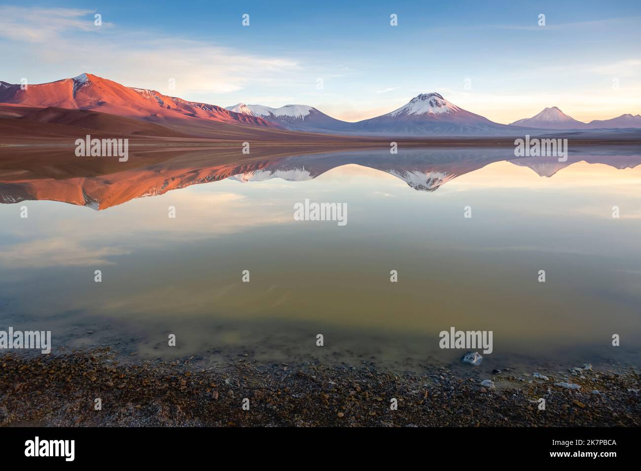 Idyllic Lake Lejia reflection and volcanic landscape in Atacama desert ...
