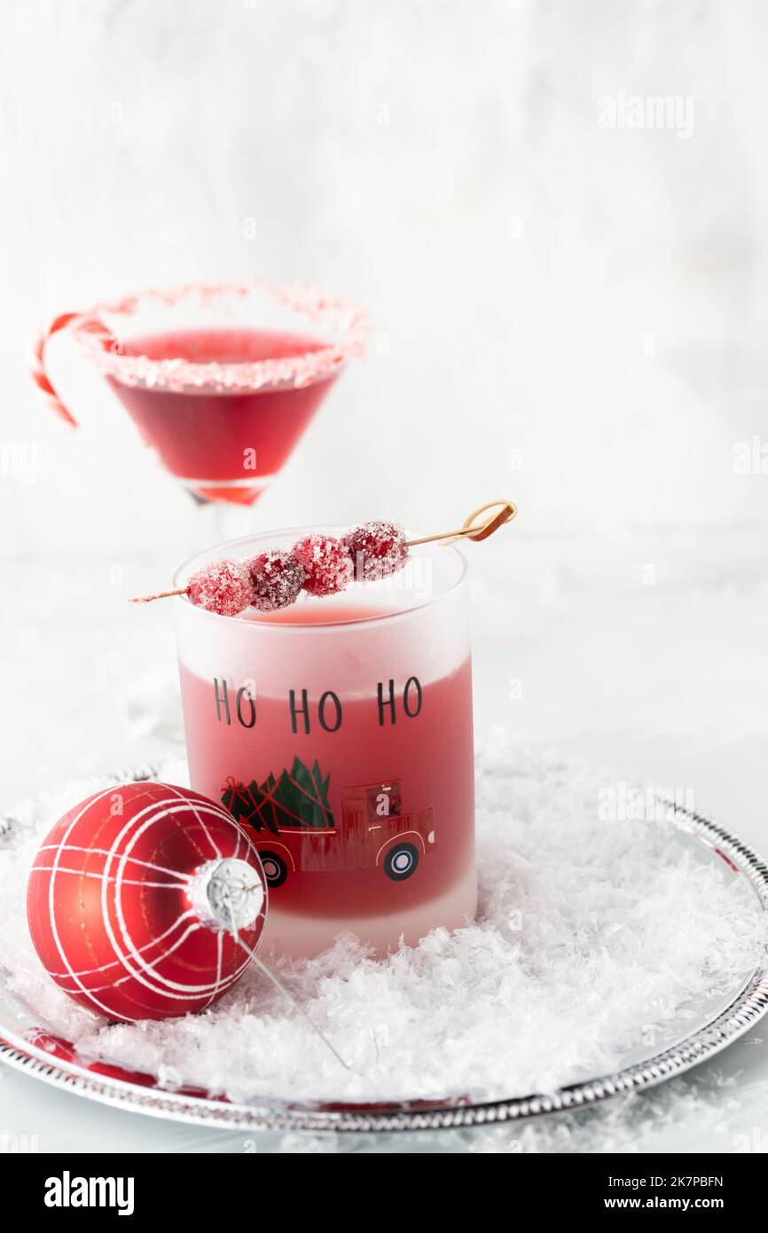 Two Christmas cocktails on a metal serving tray ready for drinking ...