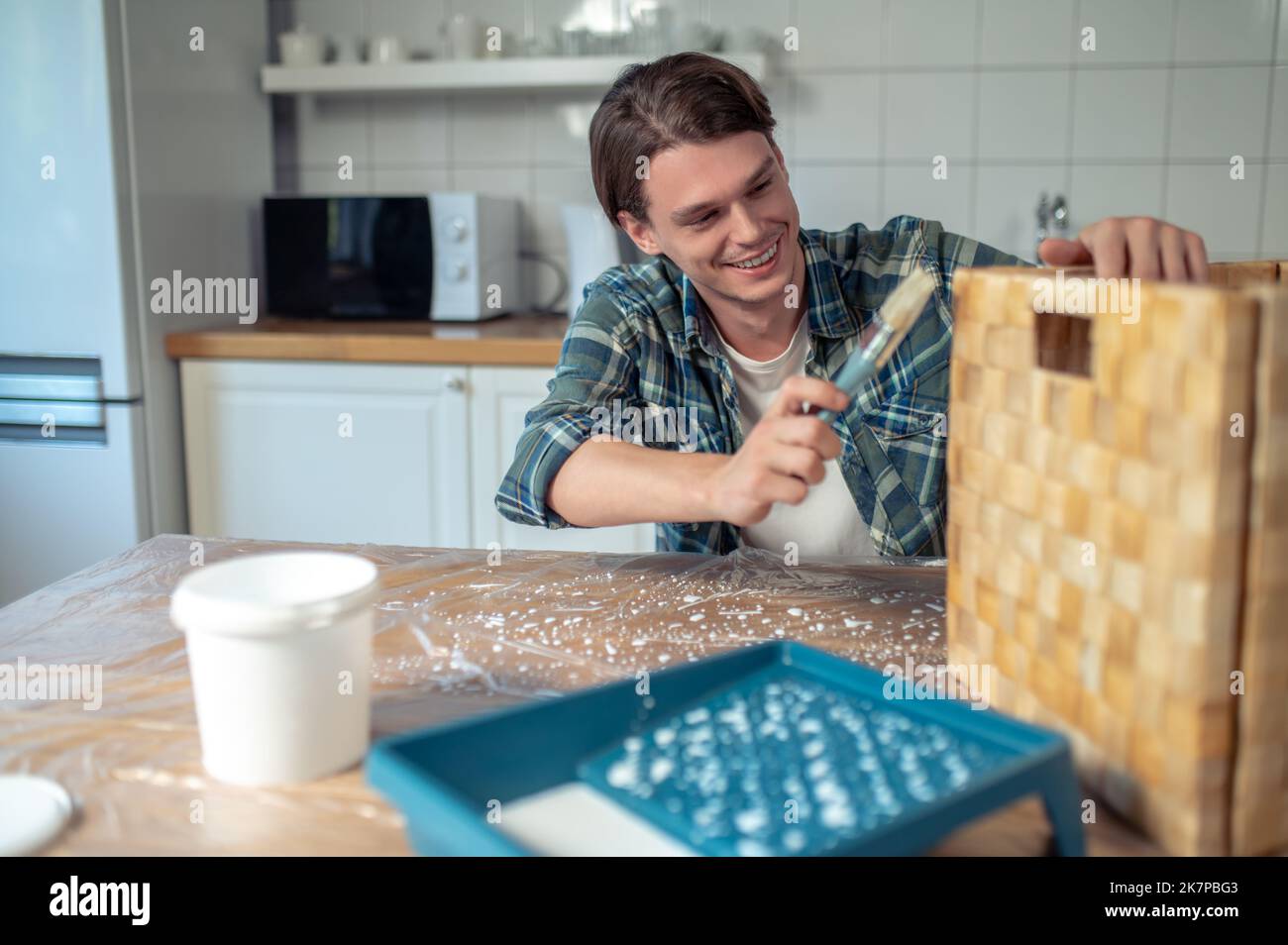 Carpenter applying coat paint hi-res stock photography and images - Alamy