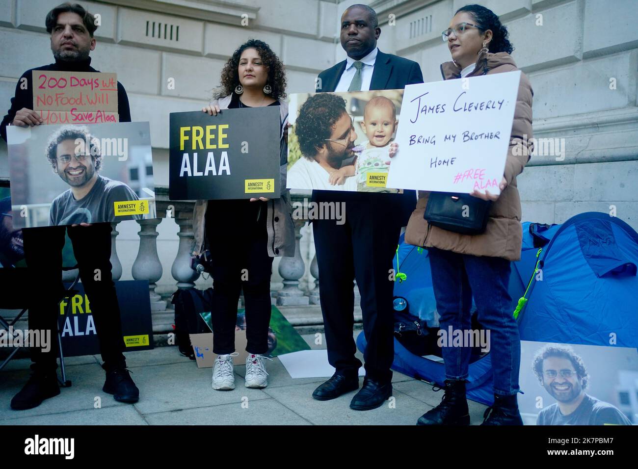 Shadow foreign secretary, David Lammy, with Mona (left) and Sanaa Seif ...