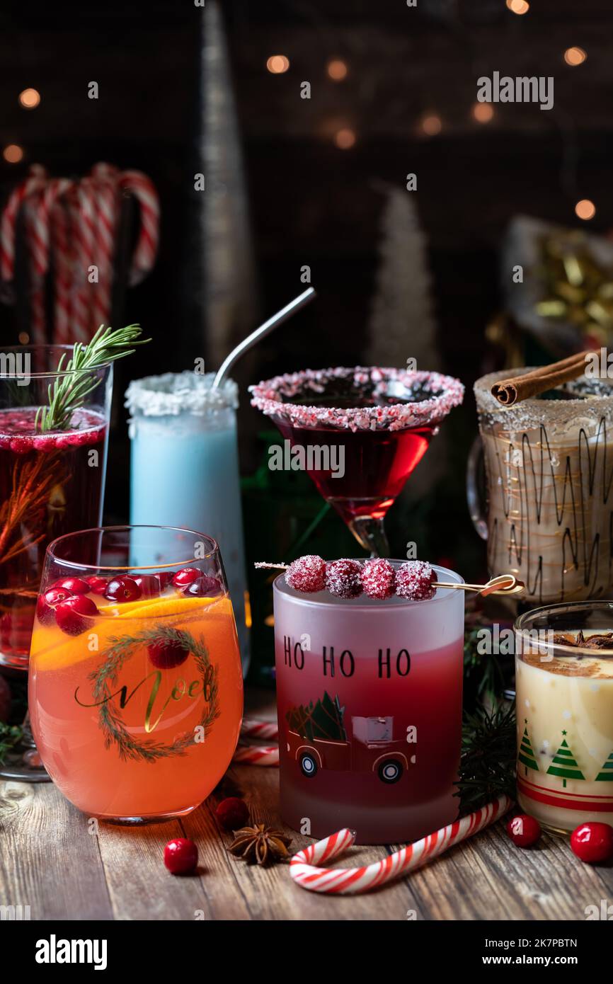Assorted Christmas cocktails against a dark festive background Stock ...