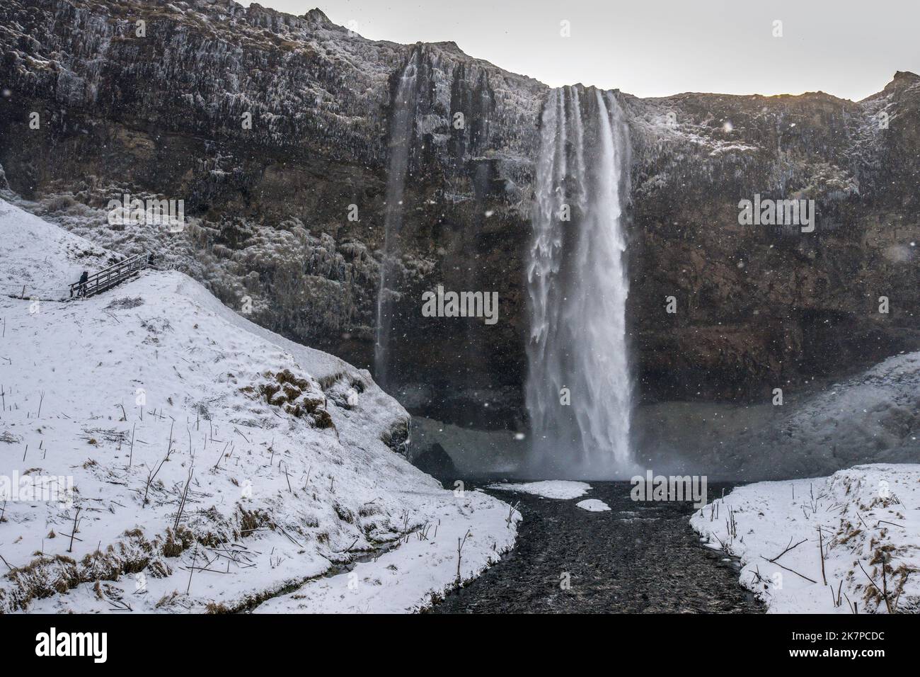 Snow and ice at Seljalandsfoss waterfall, South Iceland Stock Photo - Alamy
