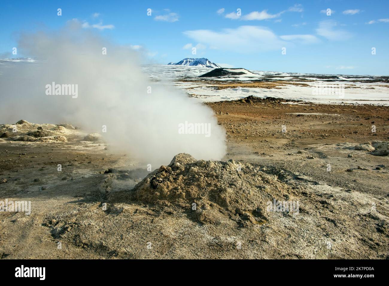 Steaming fumerole with the Hverfjall tephra ring volcano in the ...