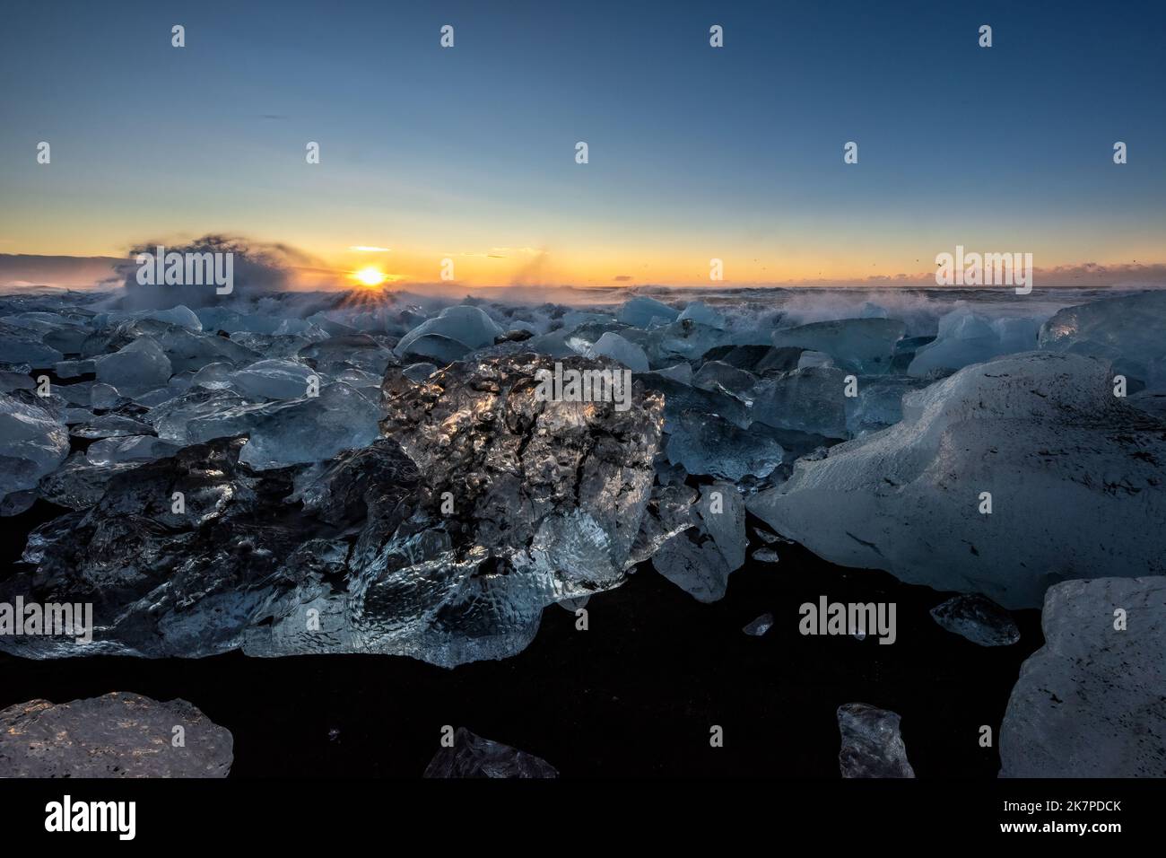 Sun rays with crystalline and blue ice and breaking waves, Diamond ...