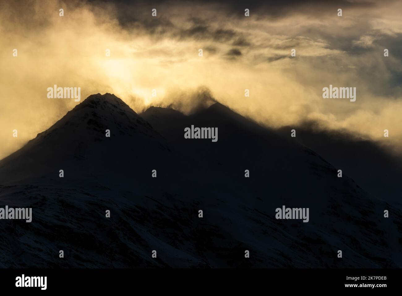 Hafrafell from Heinabergsjokull at sunset with windblown snow ...