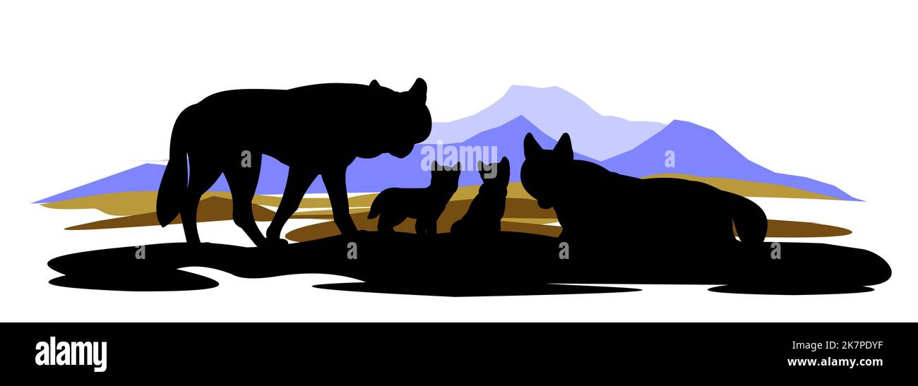 Wolf family with cubs. Plains and mountains in distance. Silhouette picture. Wild animal in ...