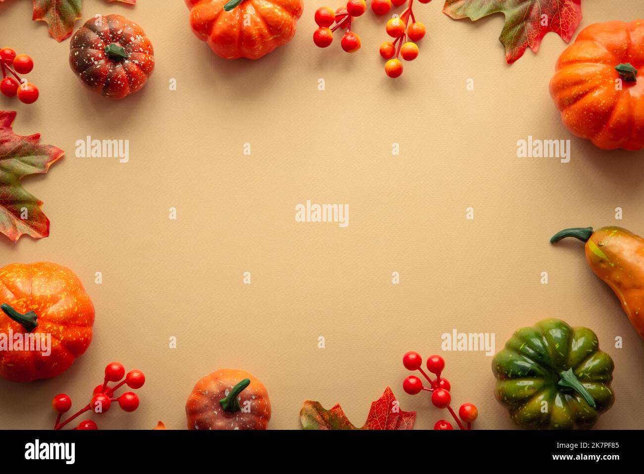Autumn flat lay background with copy space at color paper. Pumpkins ...