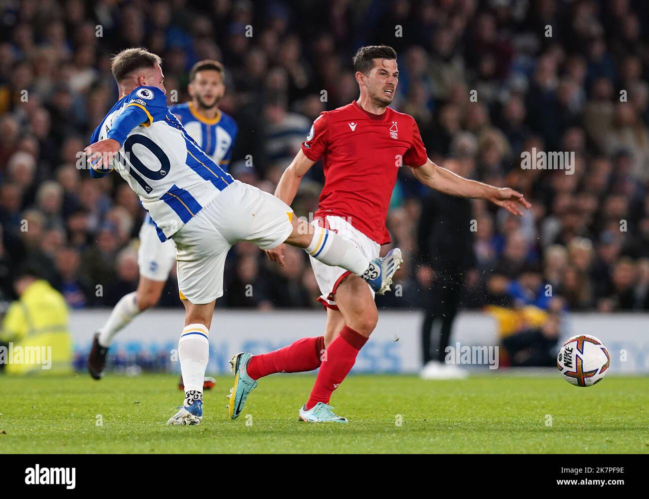 Brighton and Hove Albion's Alexis Mac Allister (left) battles with Nottingham Forest's Remo ...
