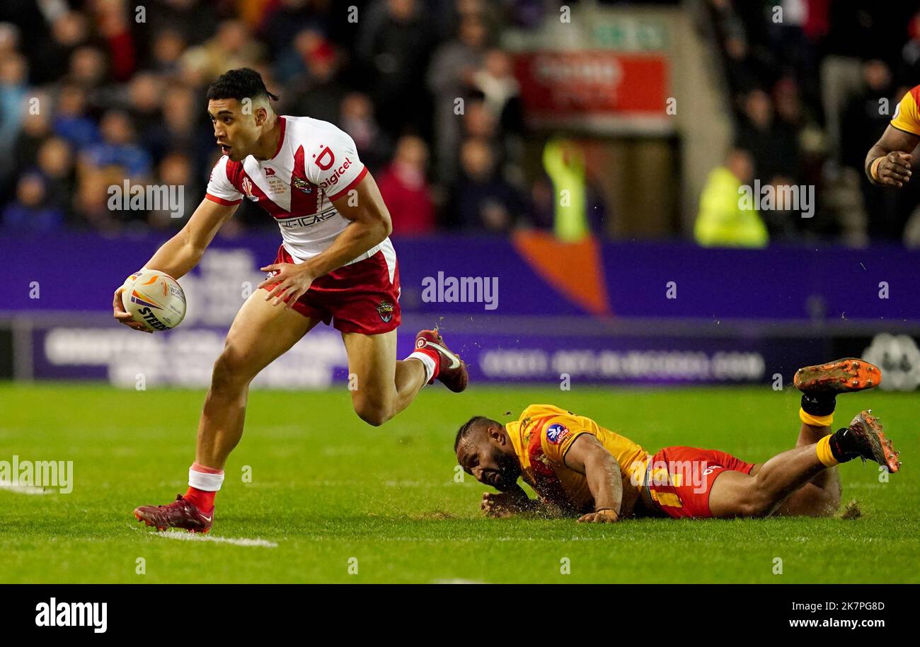 Tonga’s Tolutau Koula gets past Papua New Guinea’s Justin Olam during ...