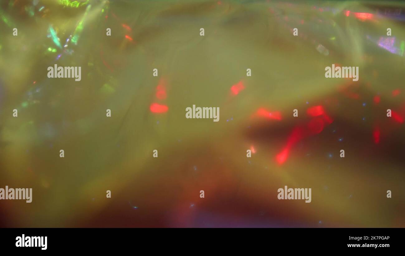 Festive holographic overlay. Beautiful light leaks. Light shine on dark ...