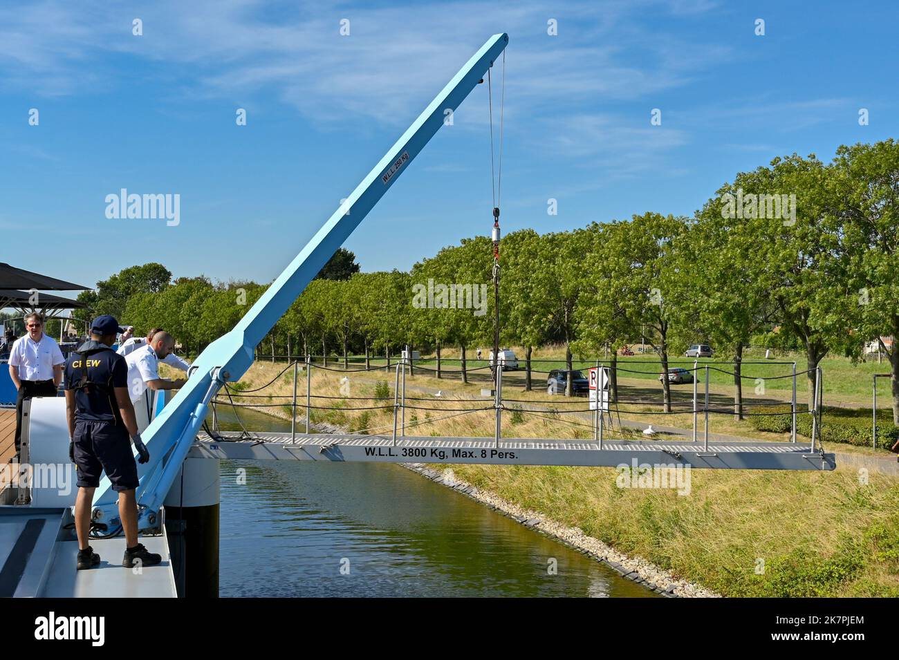 Veere, Netherlands - August 2022: Crew of a river cruise ship raising ...