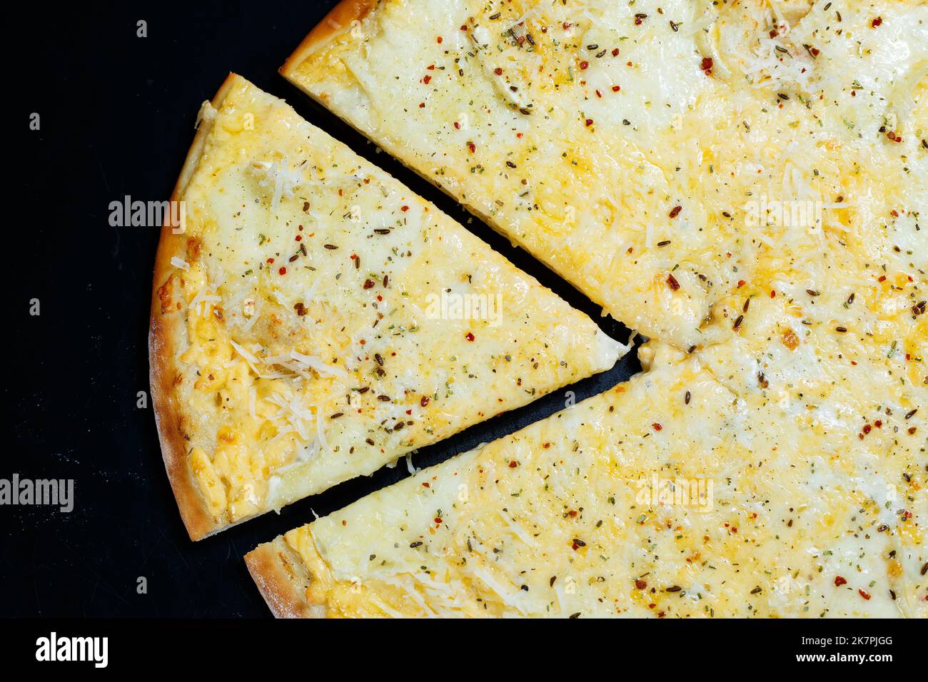 Delicious Four Cheeses pizza with cheddar, parmesan, mozzarella and ...