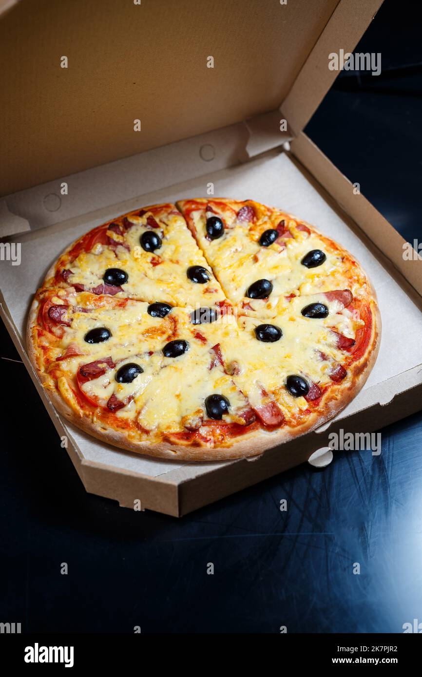 Italian pizza delivery. Delicious oven baked pizzeria dish with ...