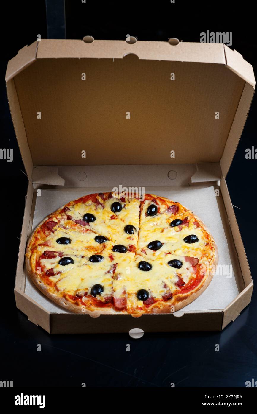 Italian pizza delivery. Delicious oven baked pizzeria dish with ...