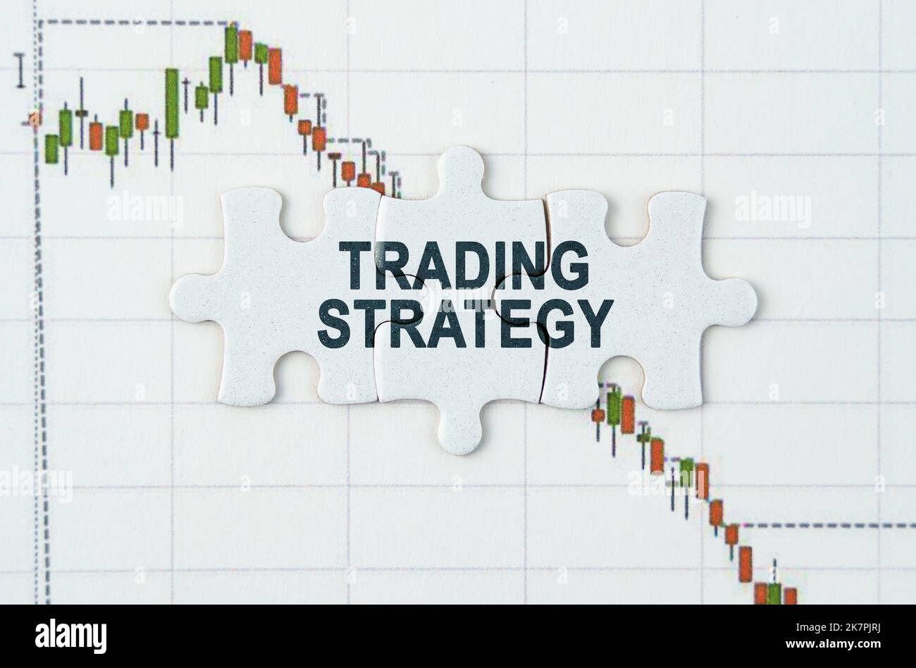 Business concept. On the quotes chart there are puzzles with the ...