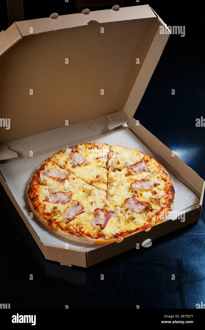 Italian pizza delivery. Delicious oven baked pizzeria dish with ...