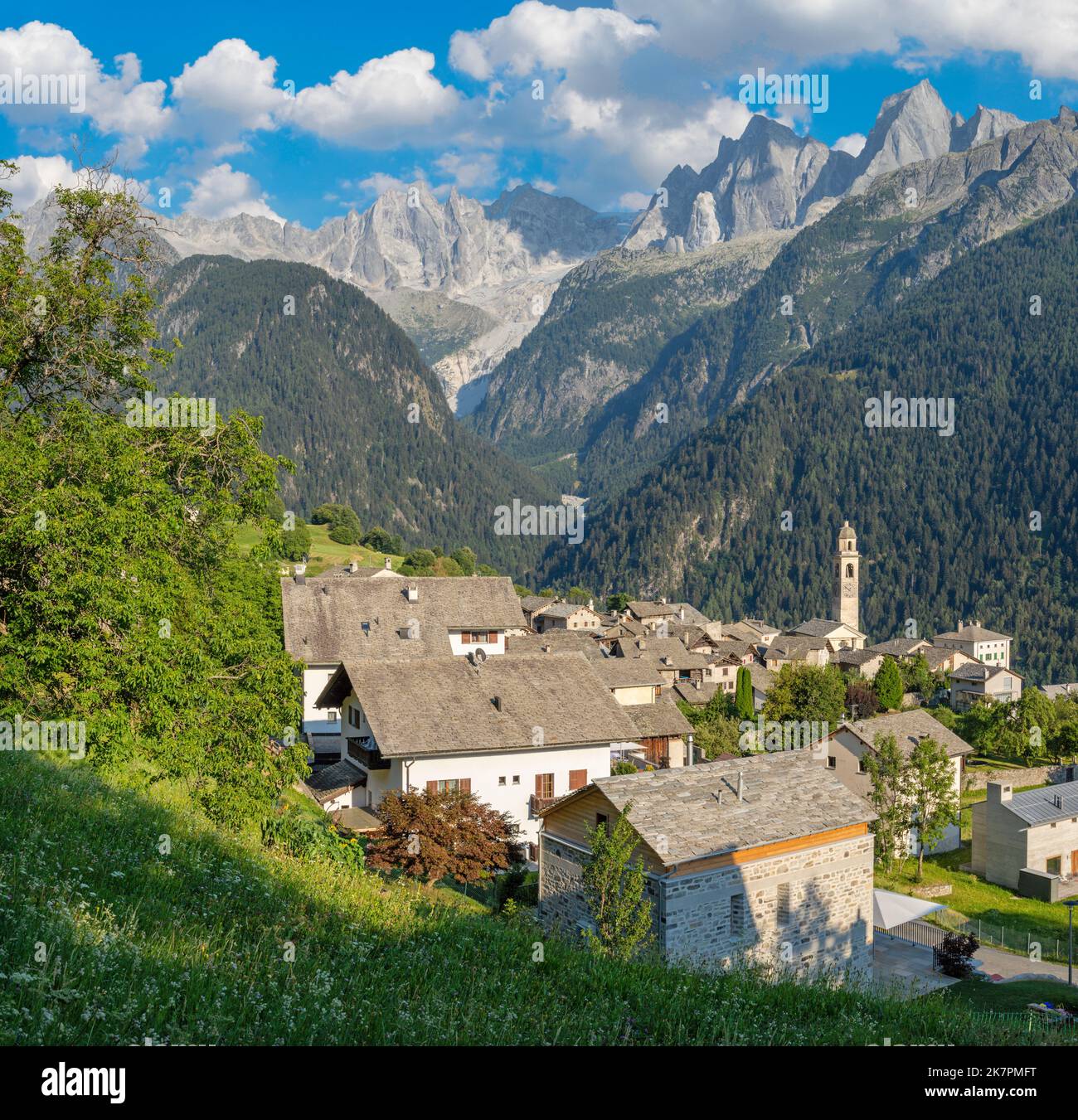 The Soglio village and Piz Badile, Pizzo Cengalo, and Sciora peaks in ...