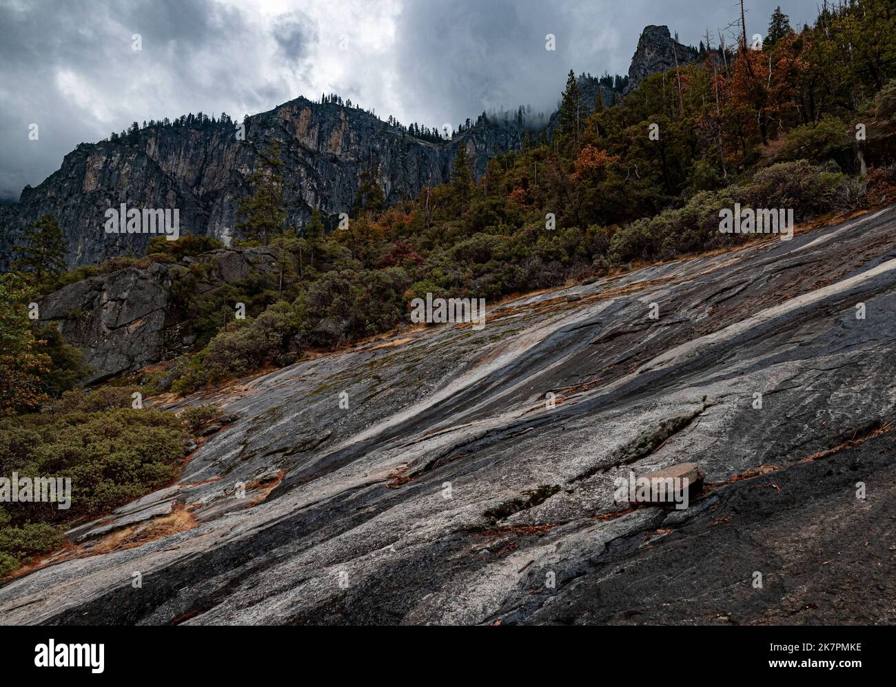 An open area of granite shows colors streaked through it, near Tunnel ...