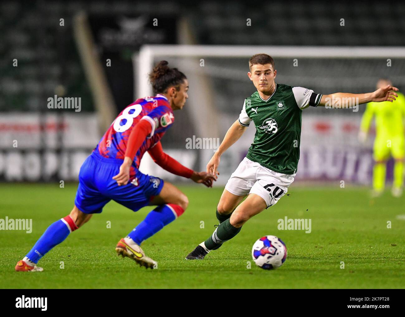 Plymouth Argyle midfielder Adam Randell (20) defending during the Papa ...