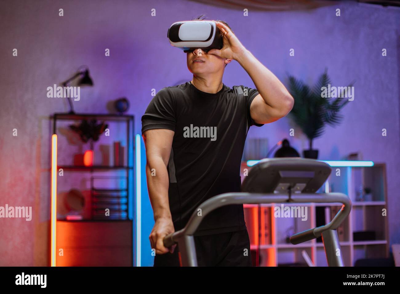 Attractive young sports asian man doing fitness exercise, running on ...