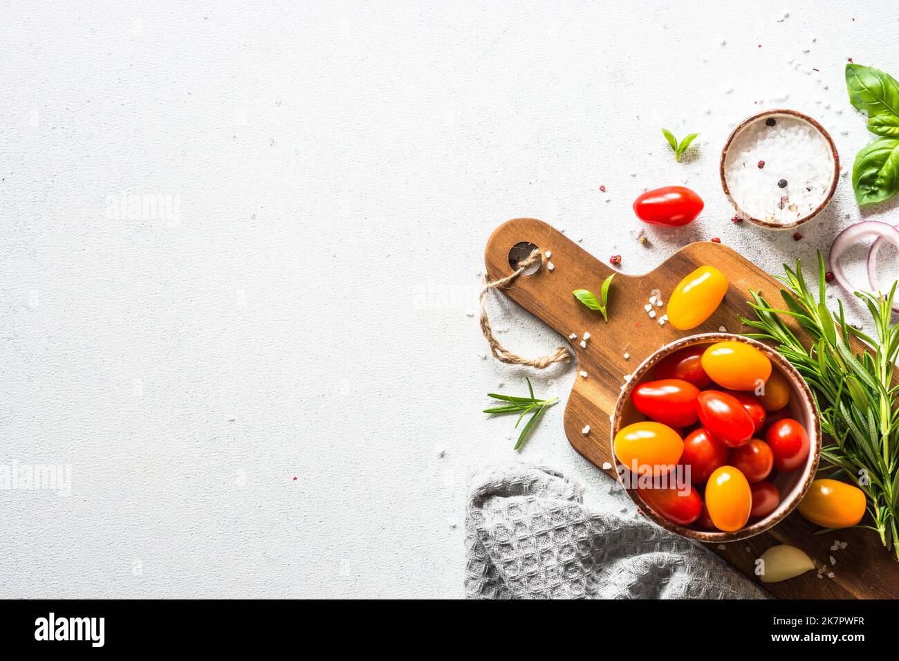 Food cooking background on white stone table Stock Photo - Alamy
