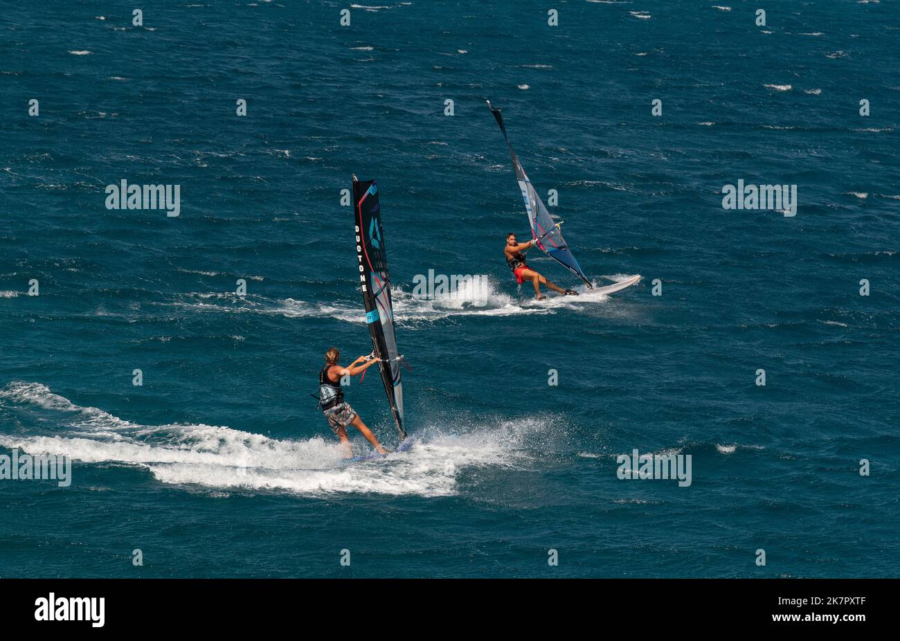 Agios Nikolaos, Crete, Greece. 2022. Wind surfers off the coast of ...