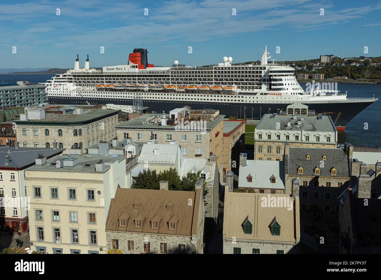 Queen Mary 2 cruise ship is seen as a backdrop of the Old Quebec (Vieux ...
