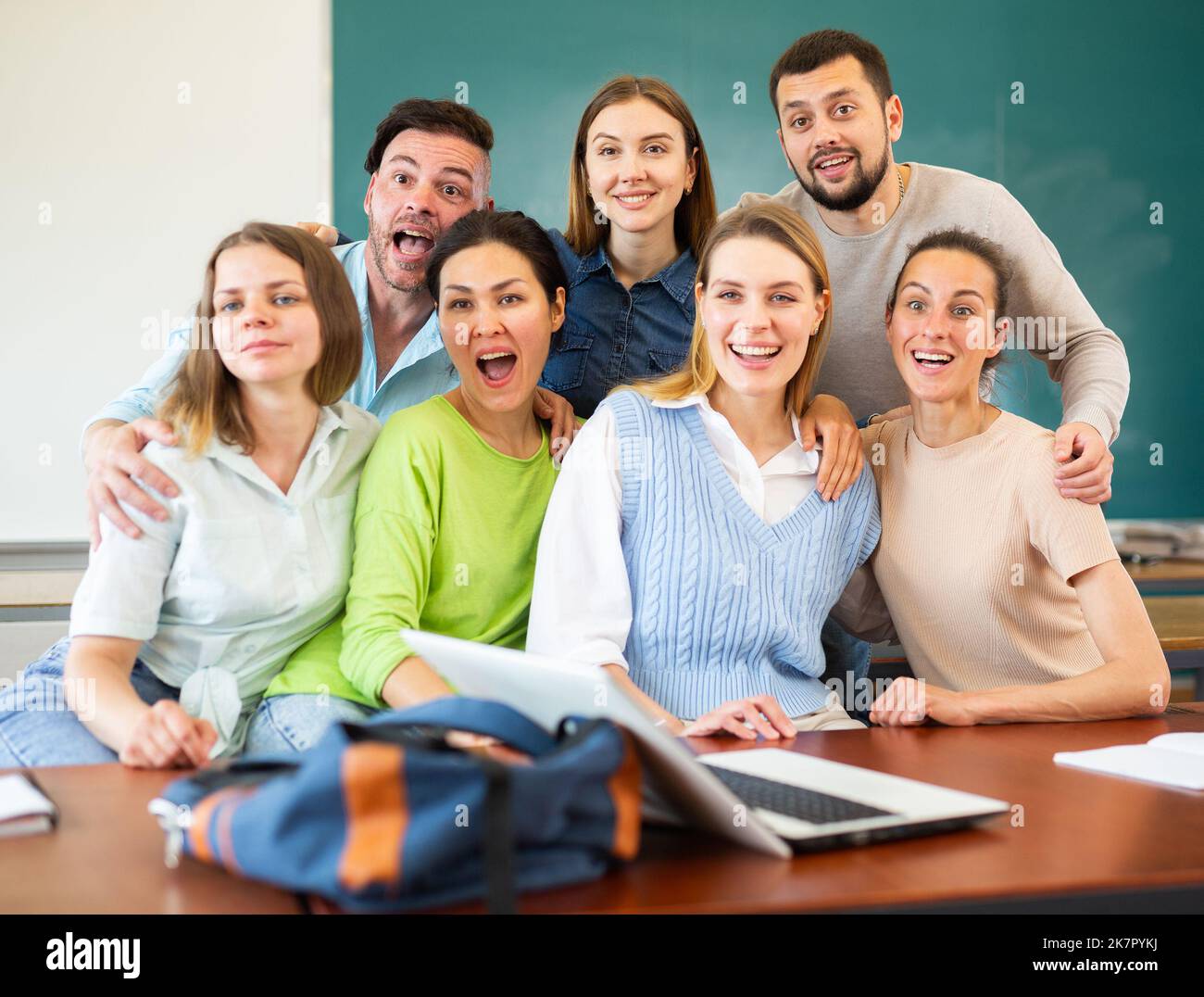 Portrait of happy group of adult students in classroom Stock Photo - Alamy