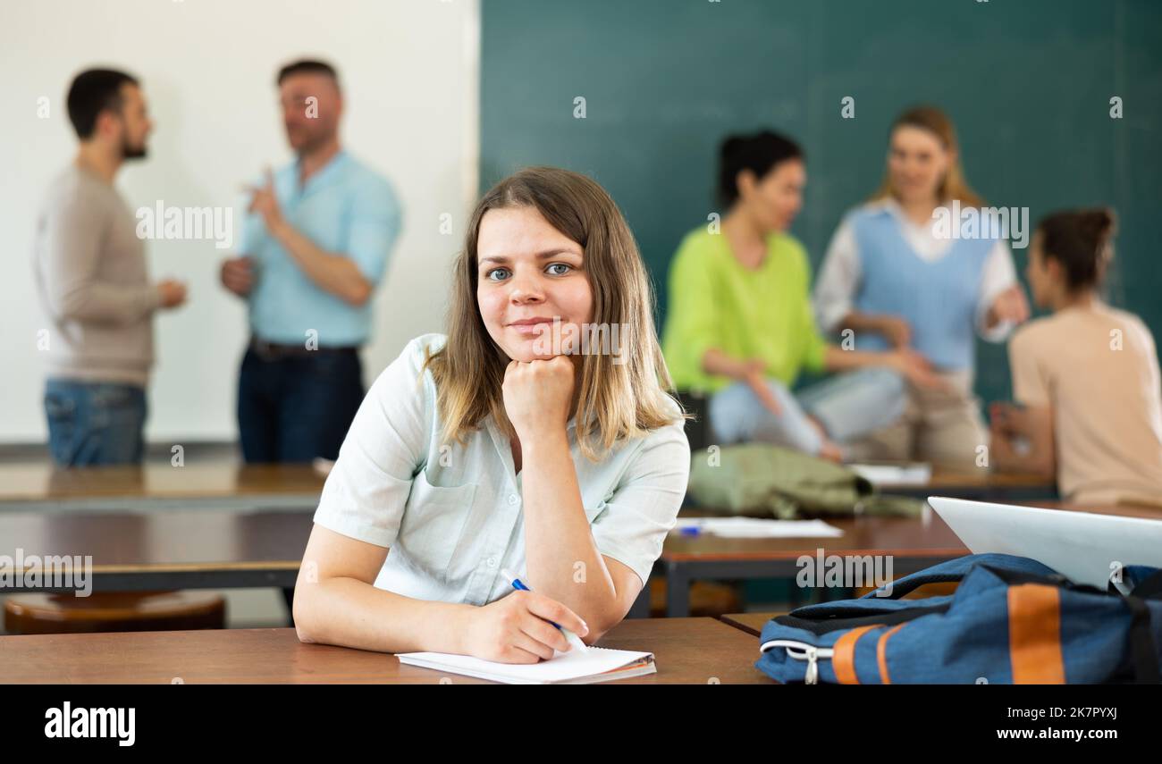 Portrait of an adult positive female student during class in university ...