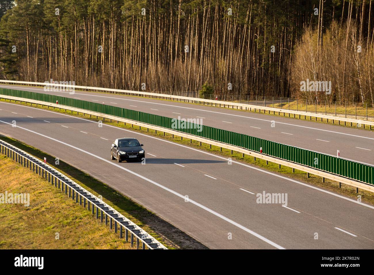 Car driving on the A2 motorway, polish partially tolled motorway ...