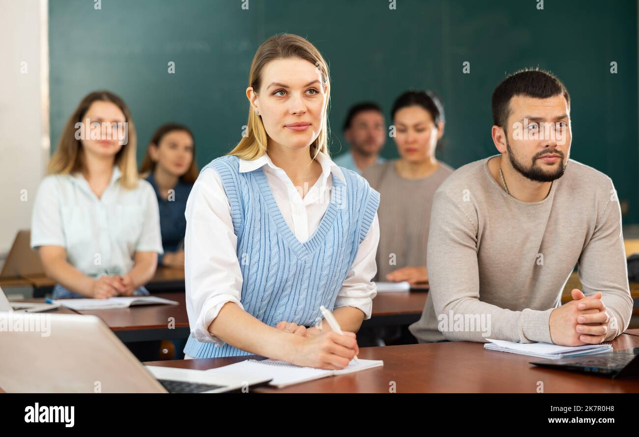 Concentrated students studying in the university auditorium Stock Photo ...