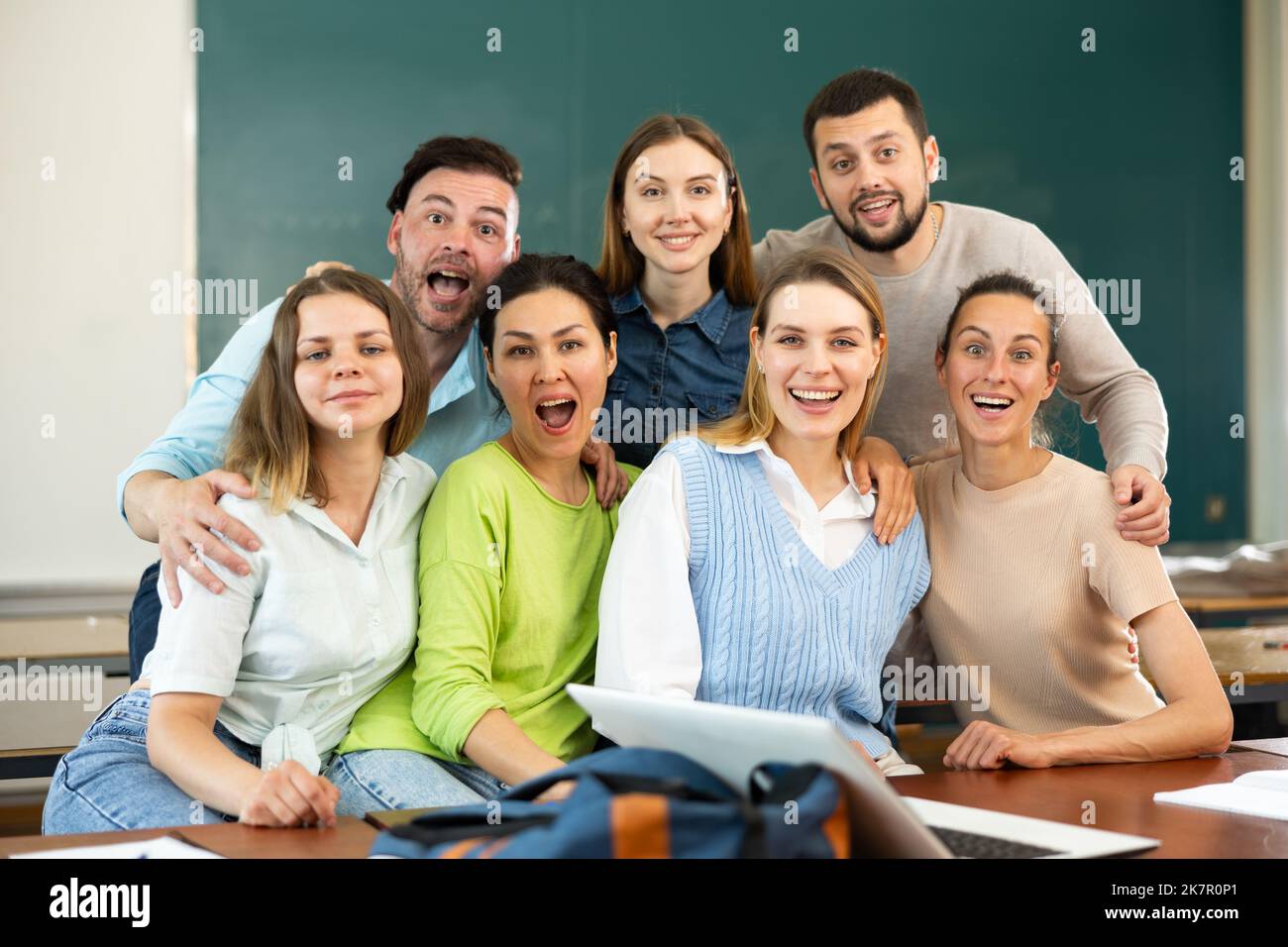 Portrait of happy group of adult students in classroom Stock Photo - Alamy