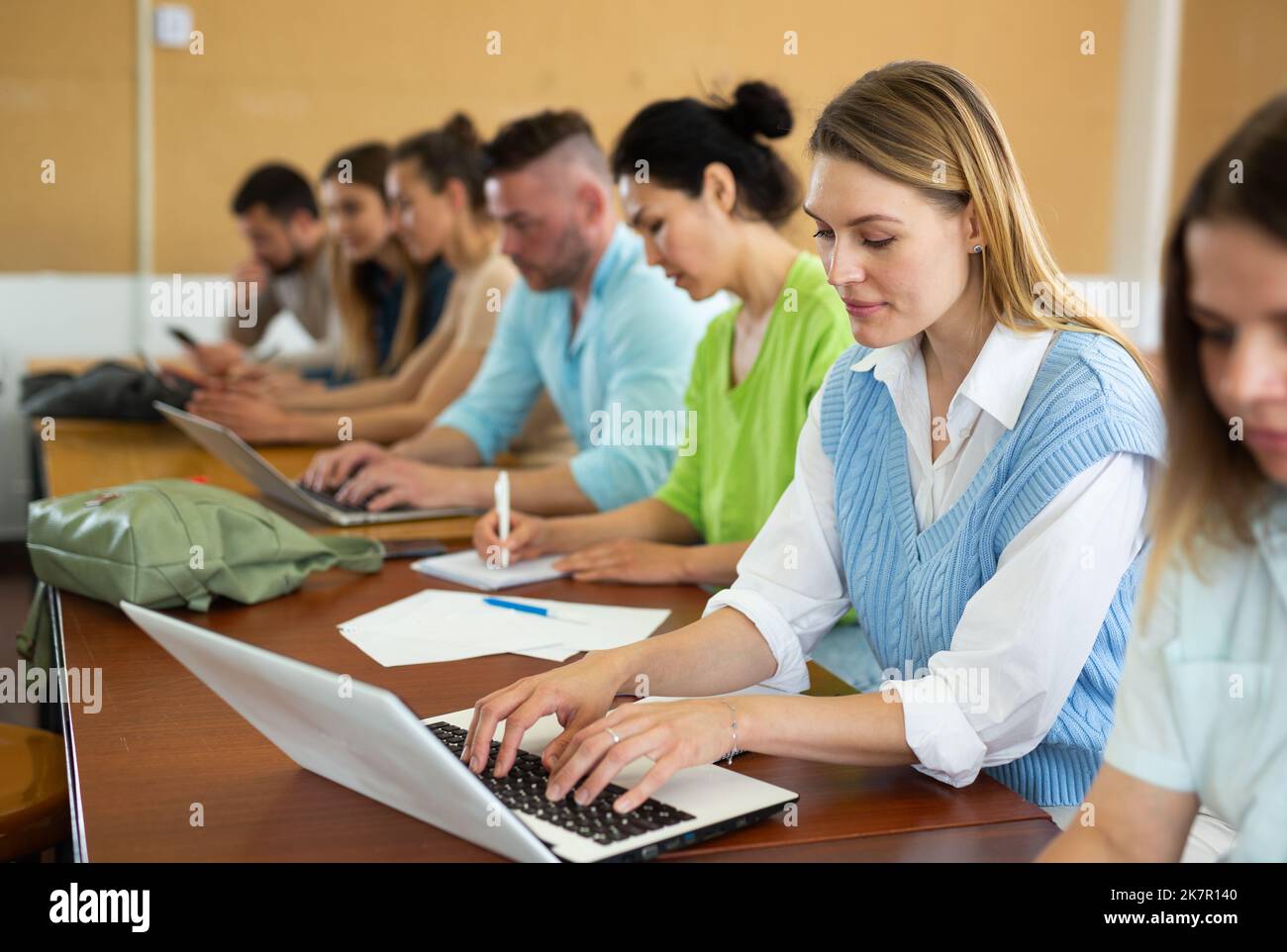 Portrait of a girl student studying on a laptop during class Stock ...