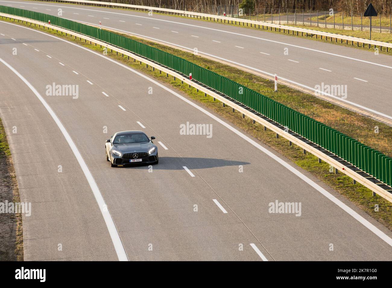 Car driving on the A2 motorway, polish partially tolled motorway ...