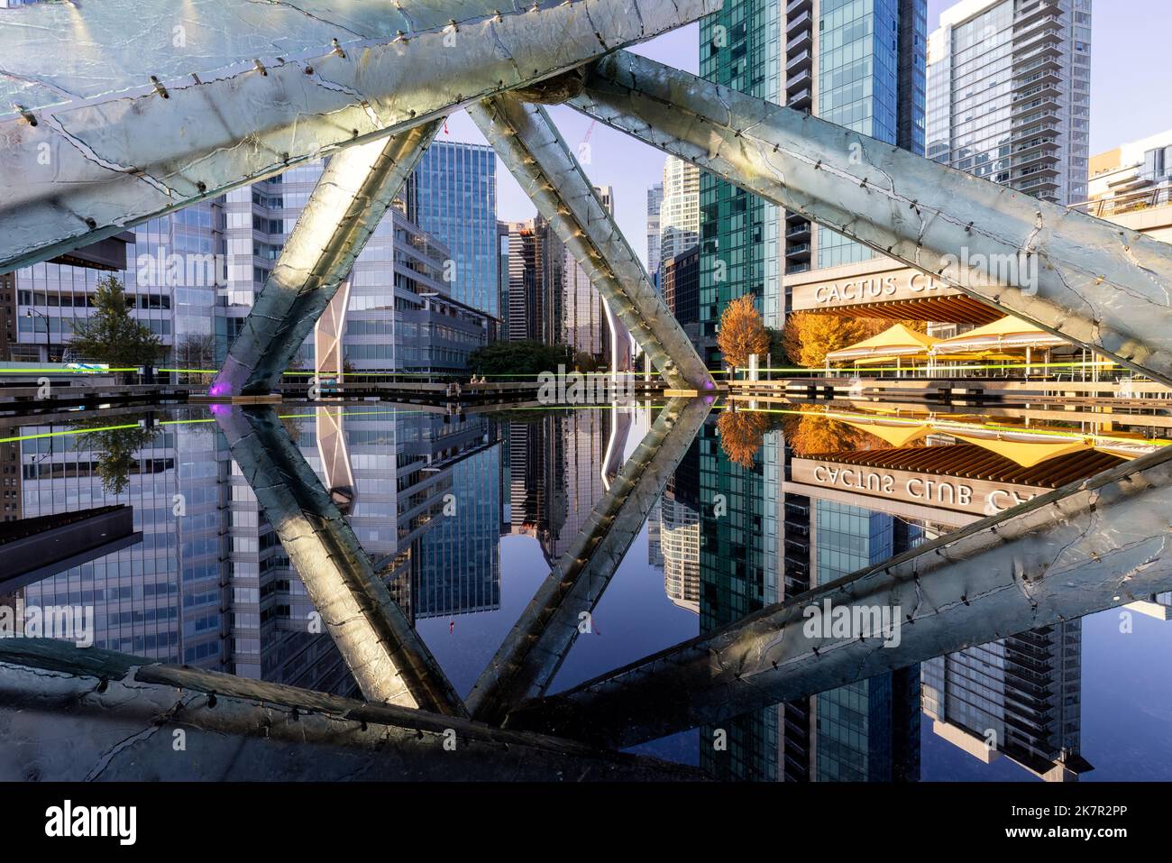 Vancouver cityscapes framed through the Olympic Cauldron in Jack Poole ...