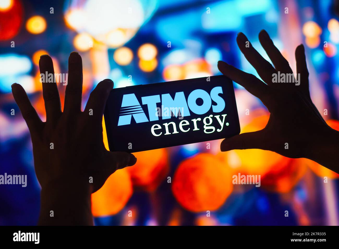 In this photo illustration, the Atmos Energy Corporation logo is ...