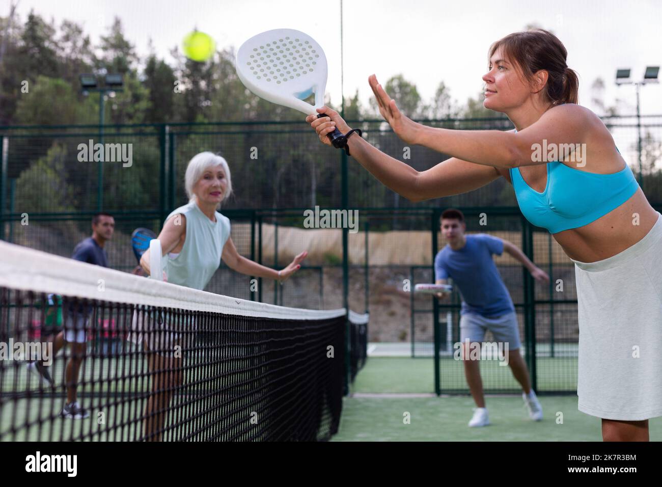 Women playing padel tennis on court Stock Photo - Alamy
