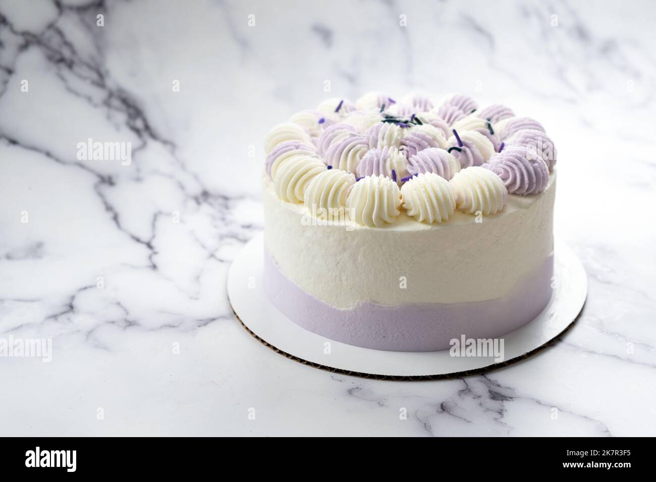 Homemade light purple yam cream cake Stock Photo - Alamy