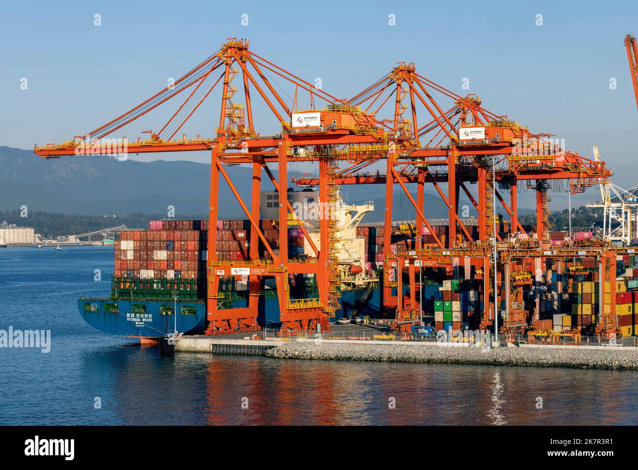Cranes loading shipping containers in the Port of Vancouver - Vancouver, British Columbia ...