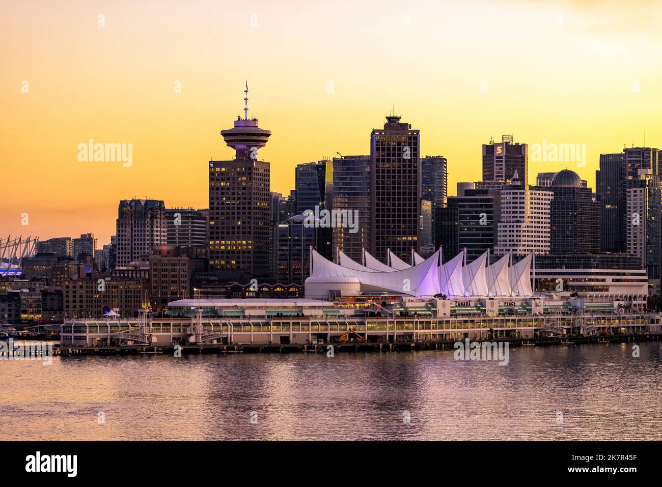 View of Canada Place and downtown Vancouver's skyline at sunset ...