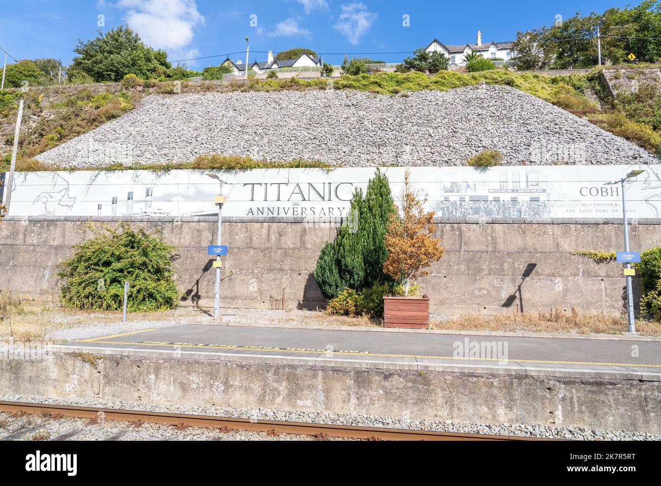 Titanic anniversary marker on wall at port in Cobh, Ireland Stock Photo ...