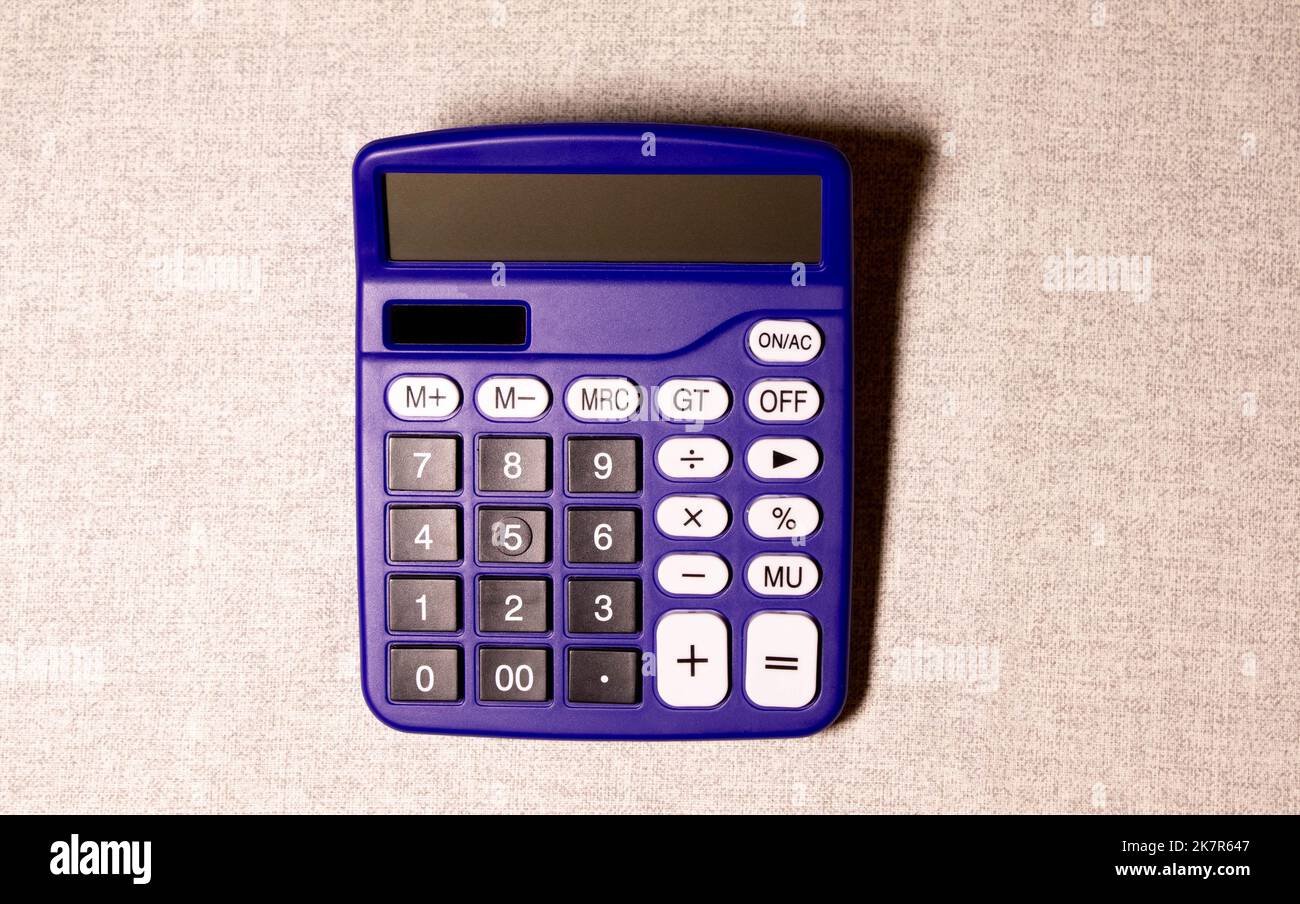 Calculator has colorful bokeh circle or defocused of glitter at night ...