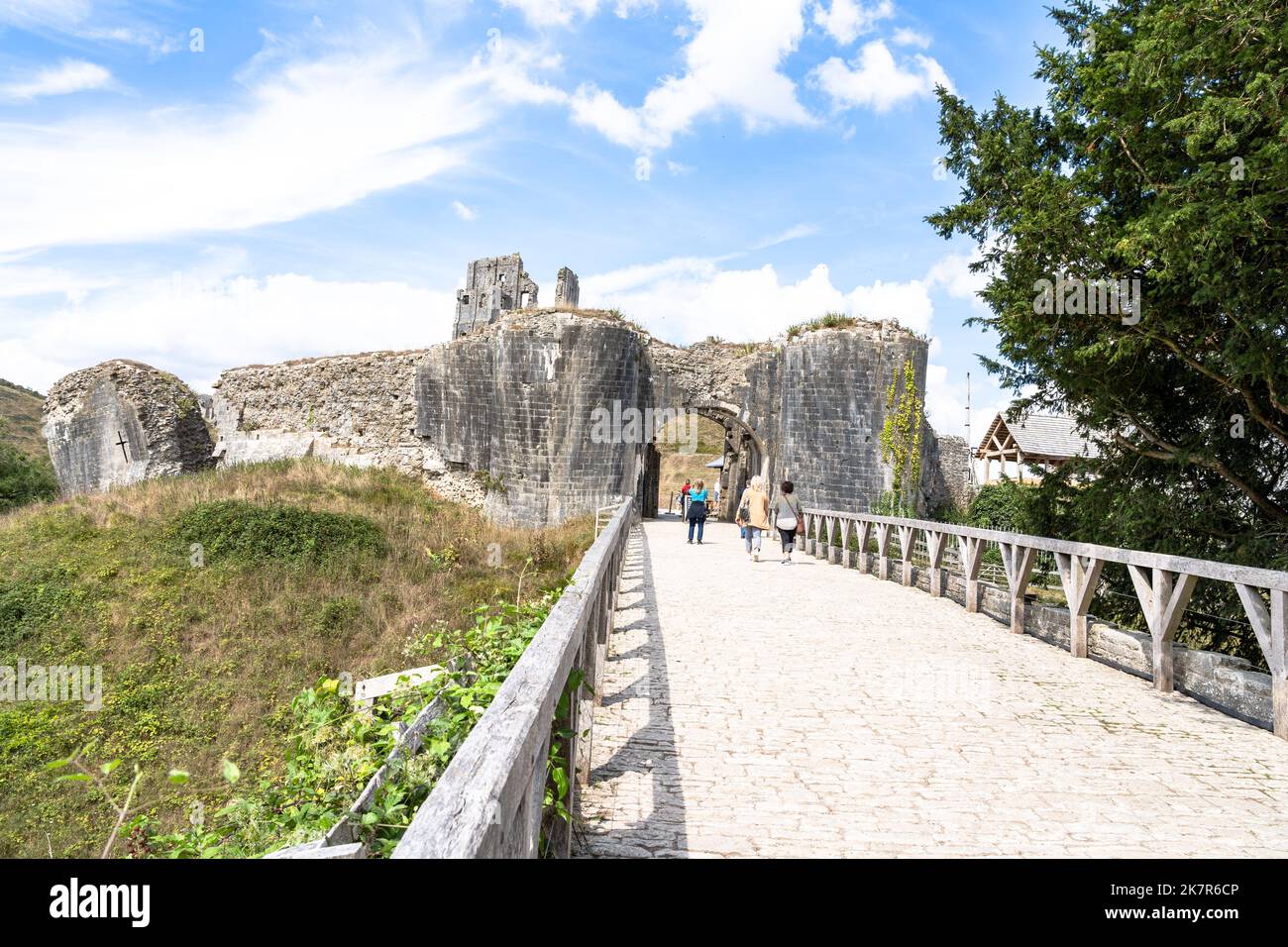 Corfe castle ruins overlook quaint village in Southern England Stock ...