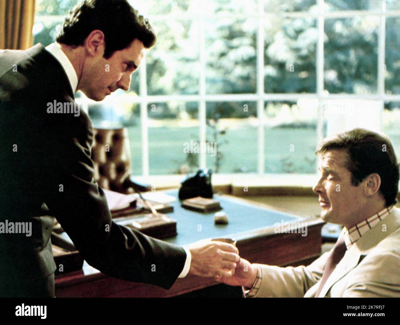 Bradford Dillman & Roger Moore Film: Gold (UK 1974) Characters: Manfred ...